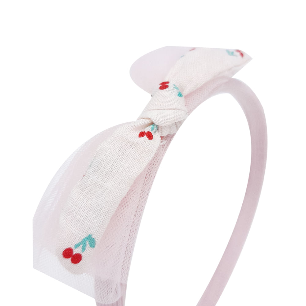 Diadema con chonga rosada con estampado para niña