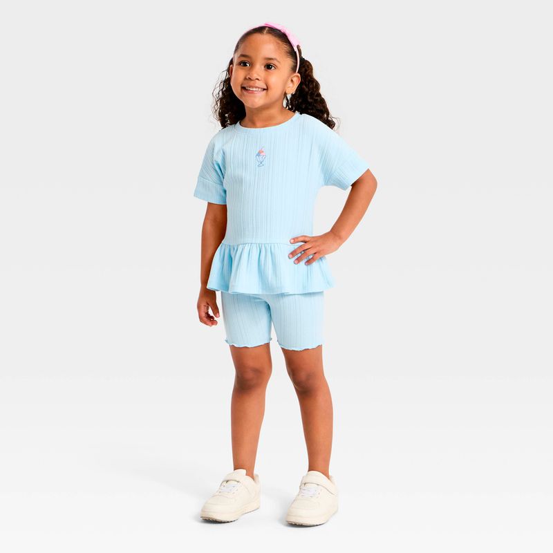 Blusa peplum celeste con bordado para niña - Siman Nicaragua